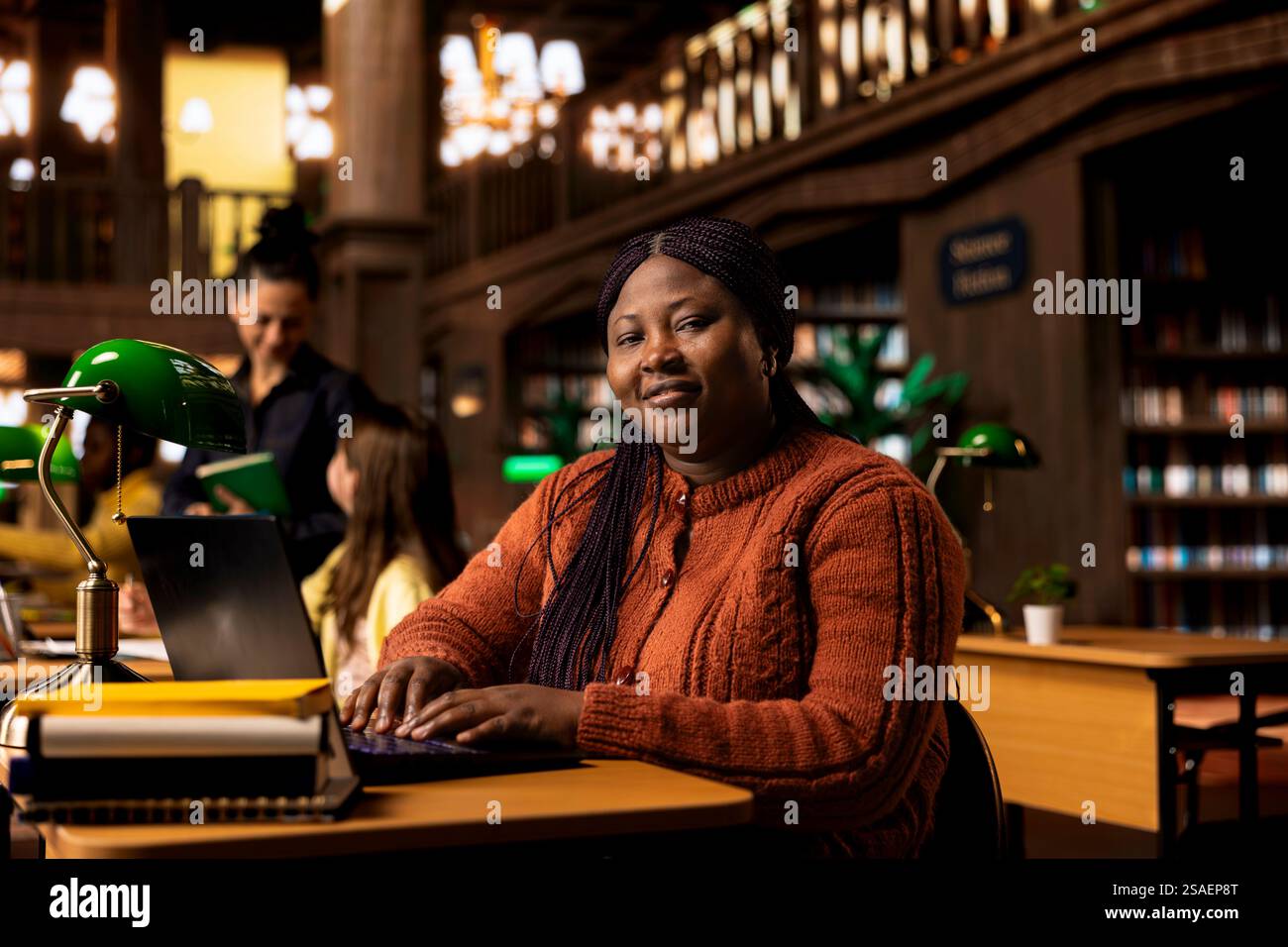 Portrait of confident tutor reviewing her notes and preparing teaching ...