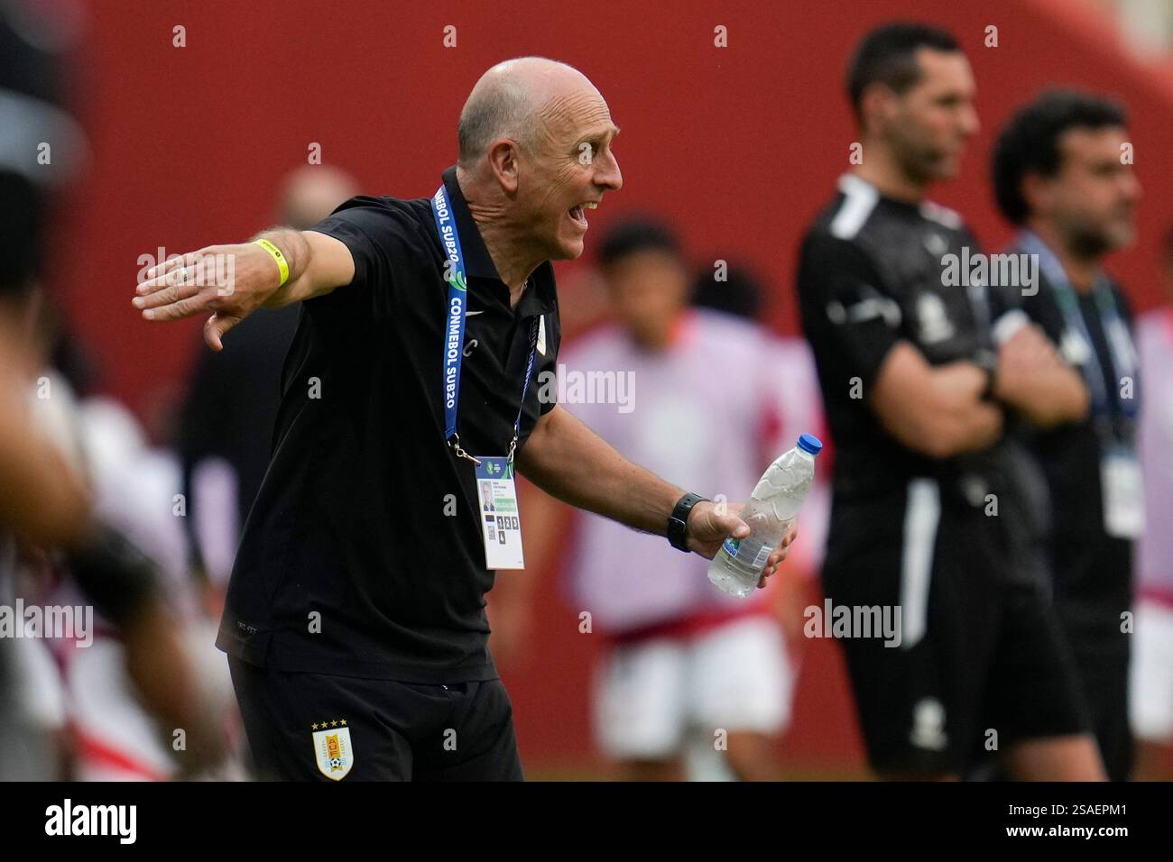Uruguay's coach Fabian Coito Machado gives instructions to his players ...