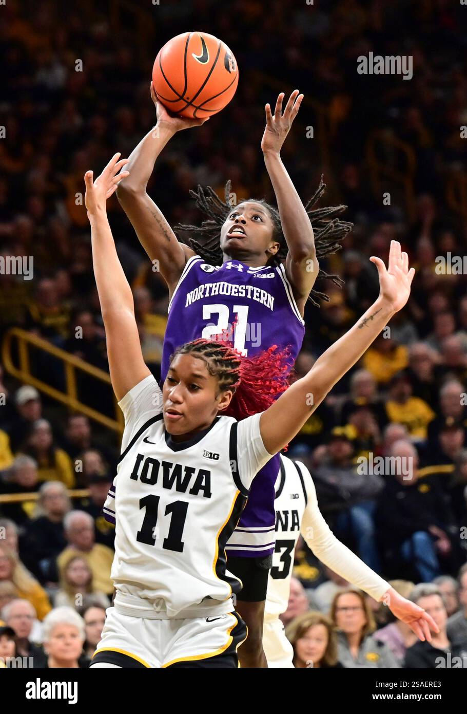 IOWA CITY, IA - JANUARY 28 - Northwestern guard Melanie Daley (21 ...