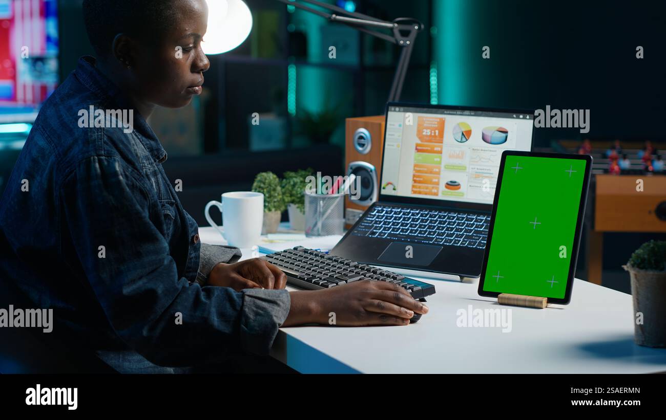 Freelancer using isolated screen tablet, analyzing statistical charts ...