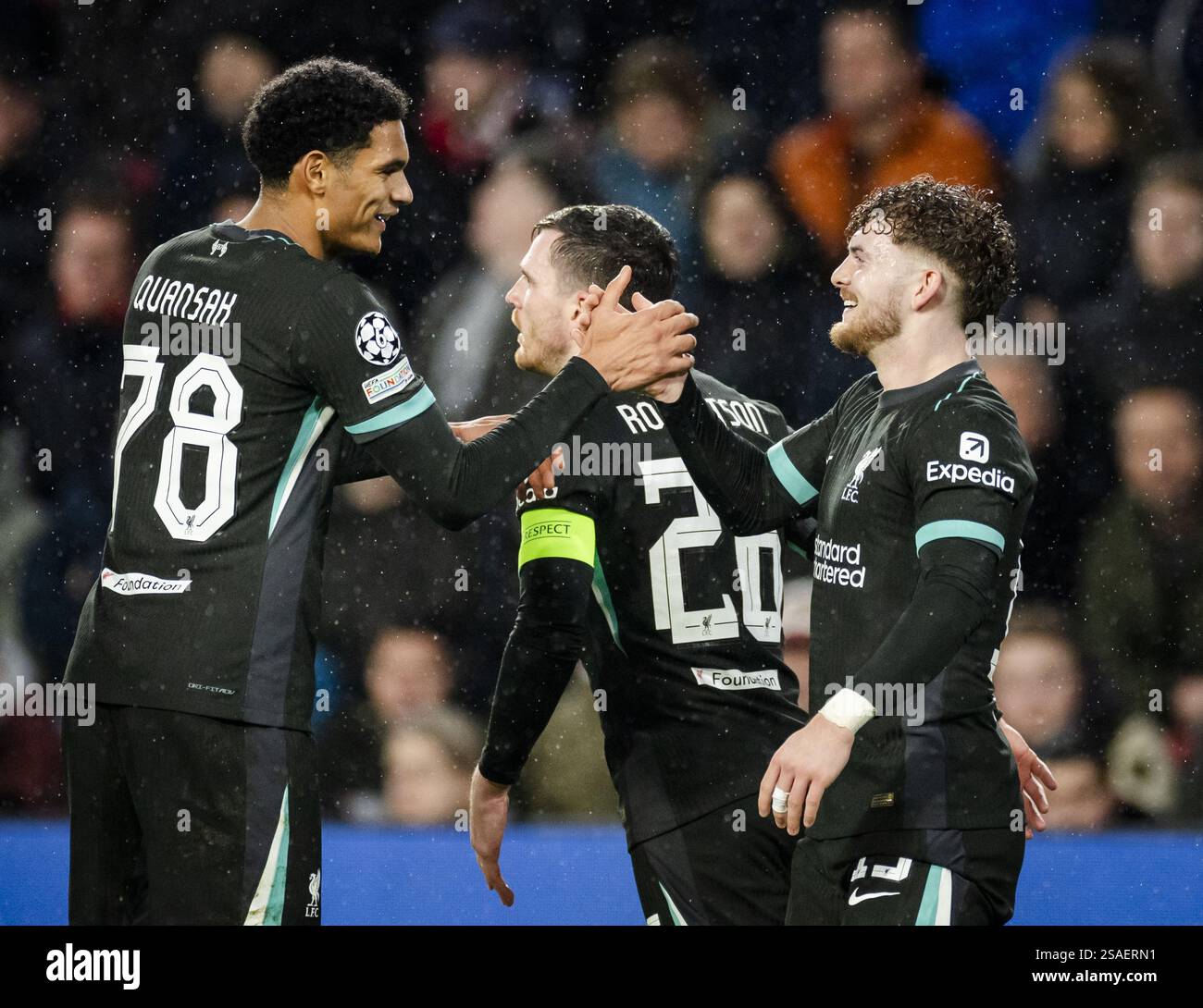 EINDHOVEN - Jarell Quansah of Liverpool FC, Andy Robertson of Liverpool ...