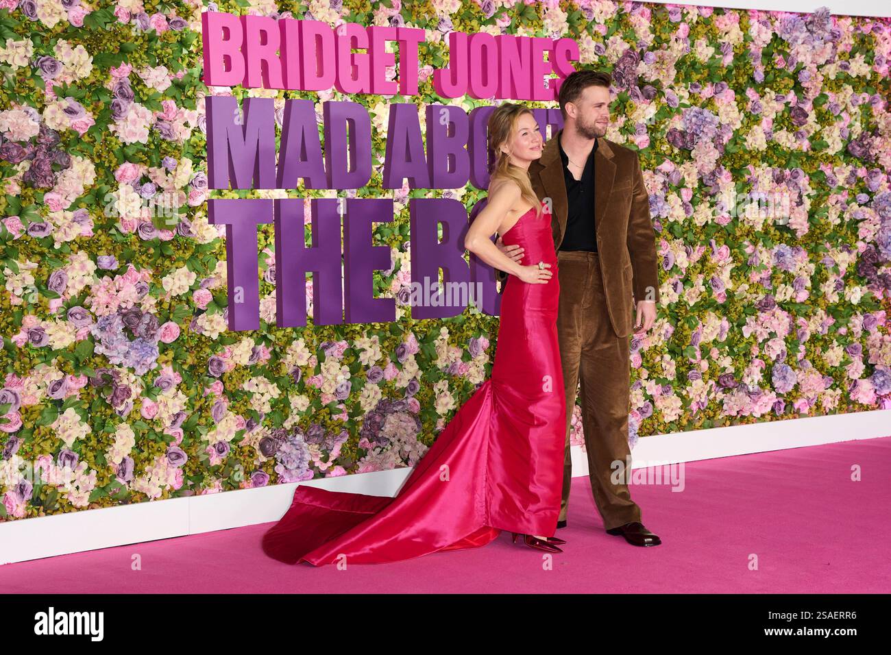 Renee Zellweger, left, and Leo Woodall pose for photographers upon ...