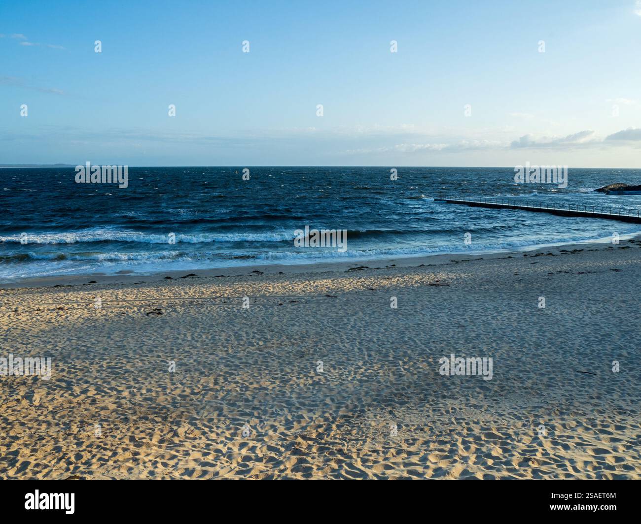 Forster beach looking across to the sand and sea to the ocean baths ...