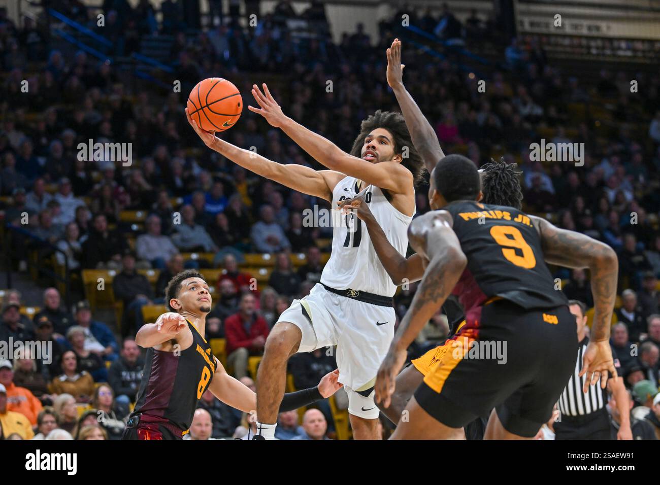 BOULDER, CO - JANUARY 28: Colorado guard Javon Ruffin (11) drives to ...