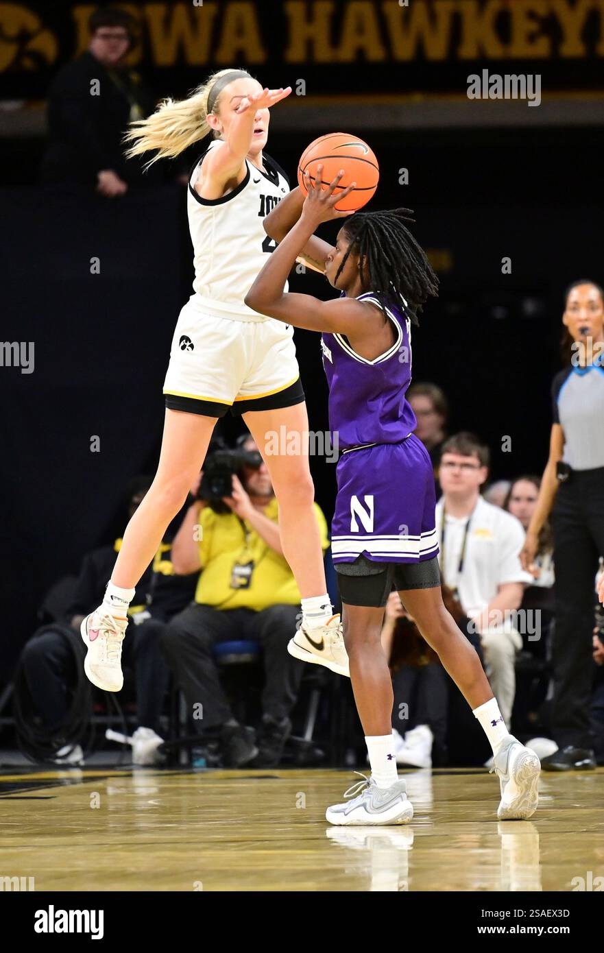 IOWA CITY, IA - JANUARY 28 - Iowa guard Kylie Feuerback (4) jumps to ...