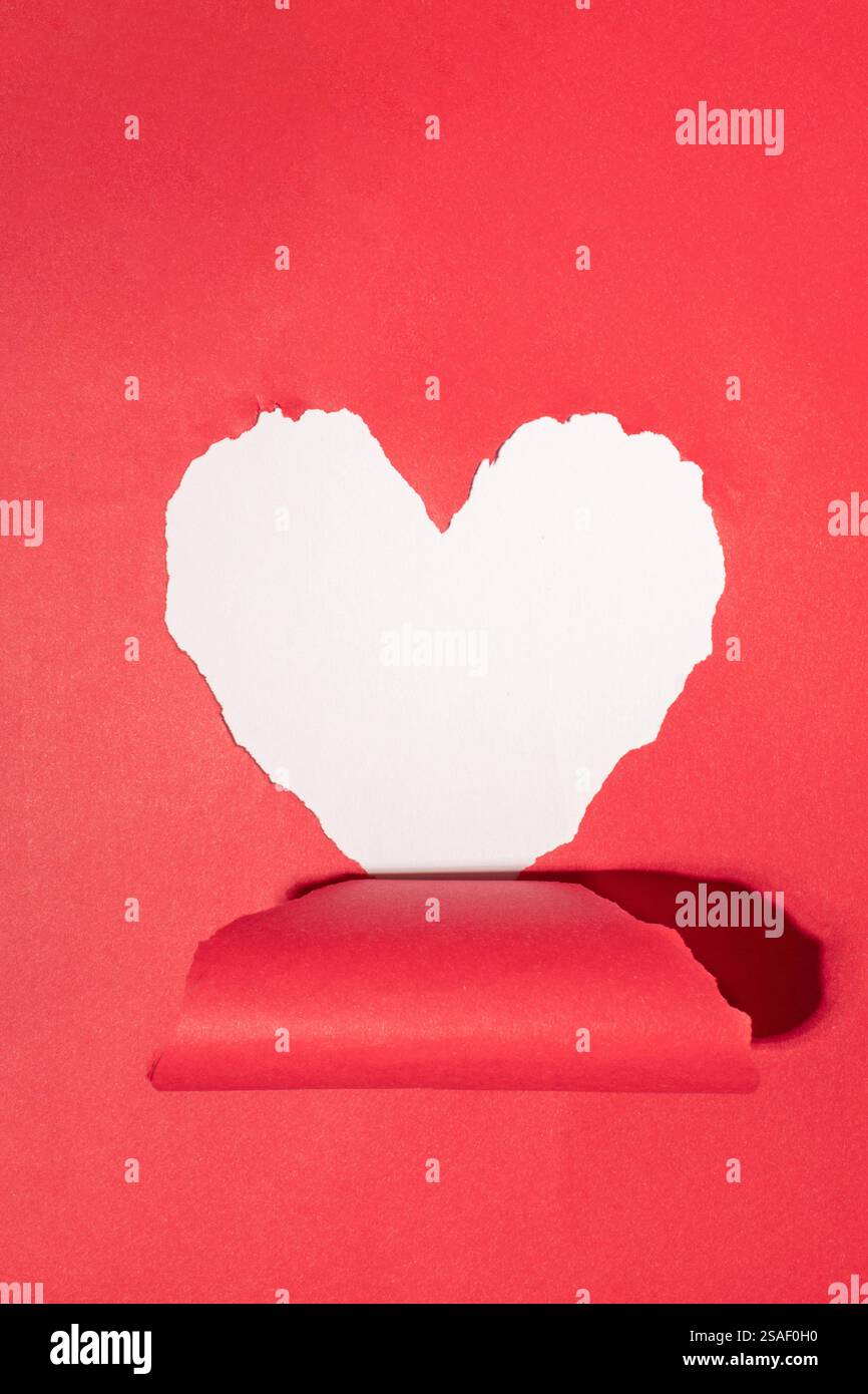 Heart shaped red torn paper. Burst hole background. Minimal abstract ...