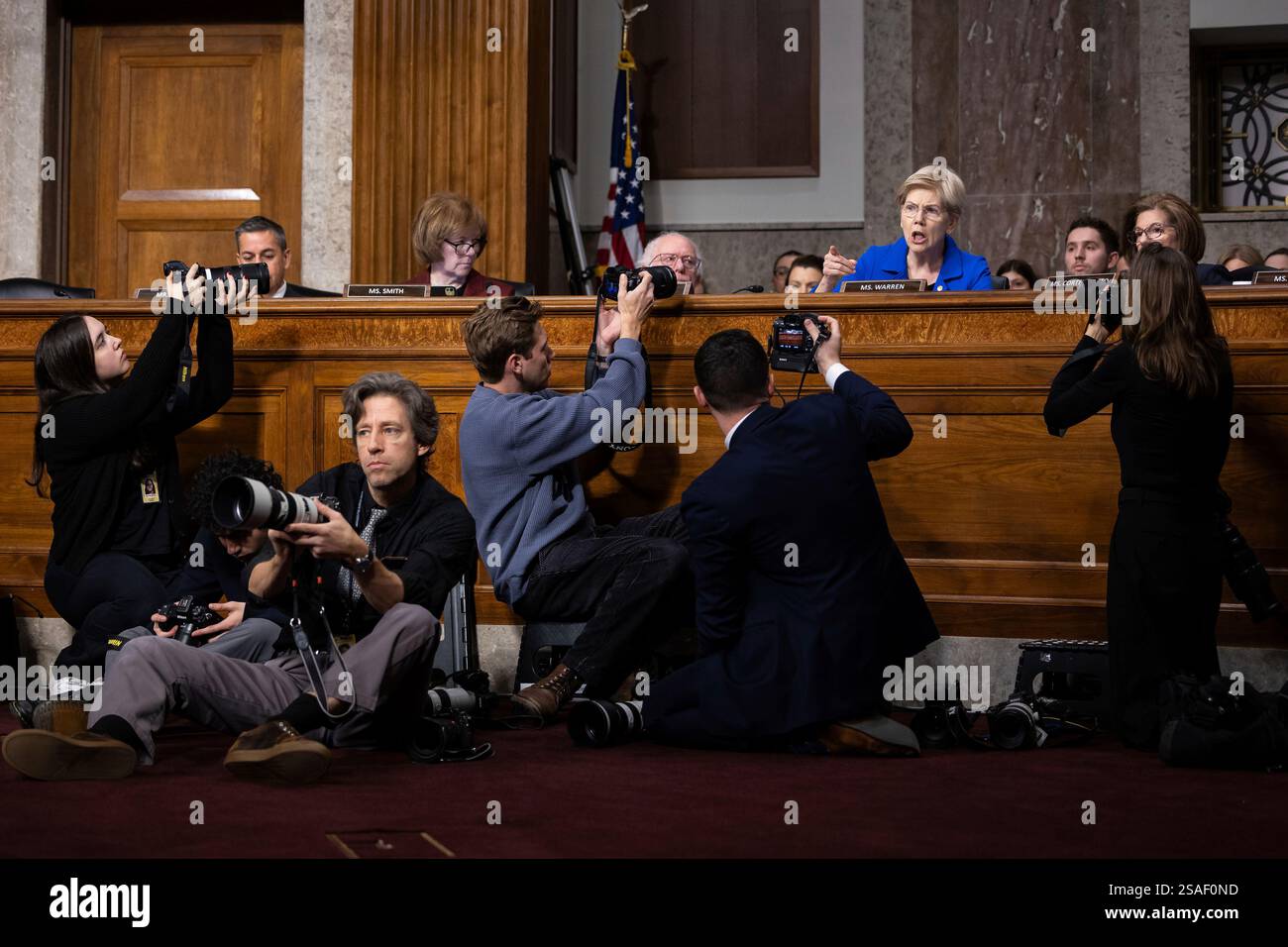 Sen,. Elizabeth Warren (D-Mass.) speaks while other senators and ...