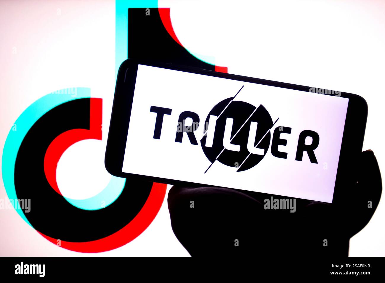 India. 28th Jan, 2025. In this photo illustration, a Triller logo is ...