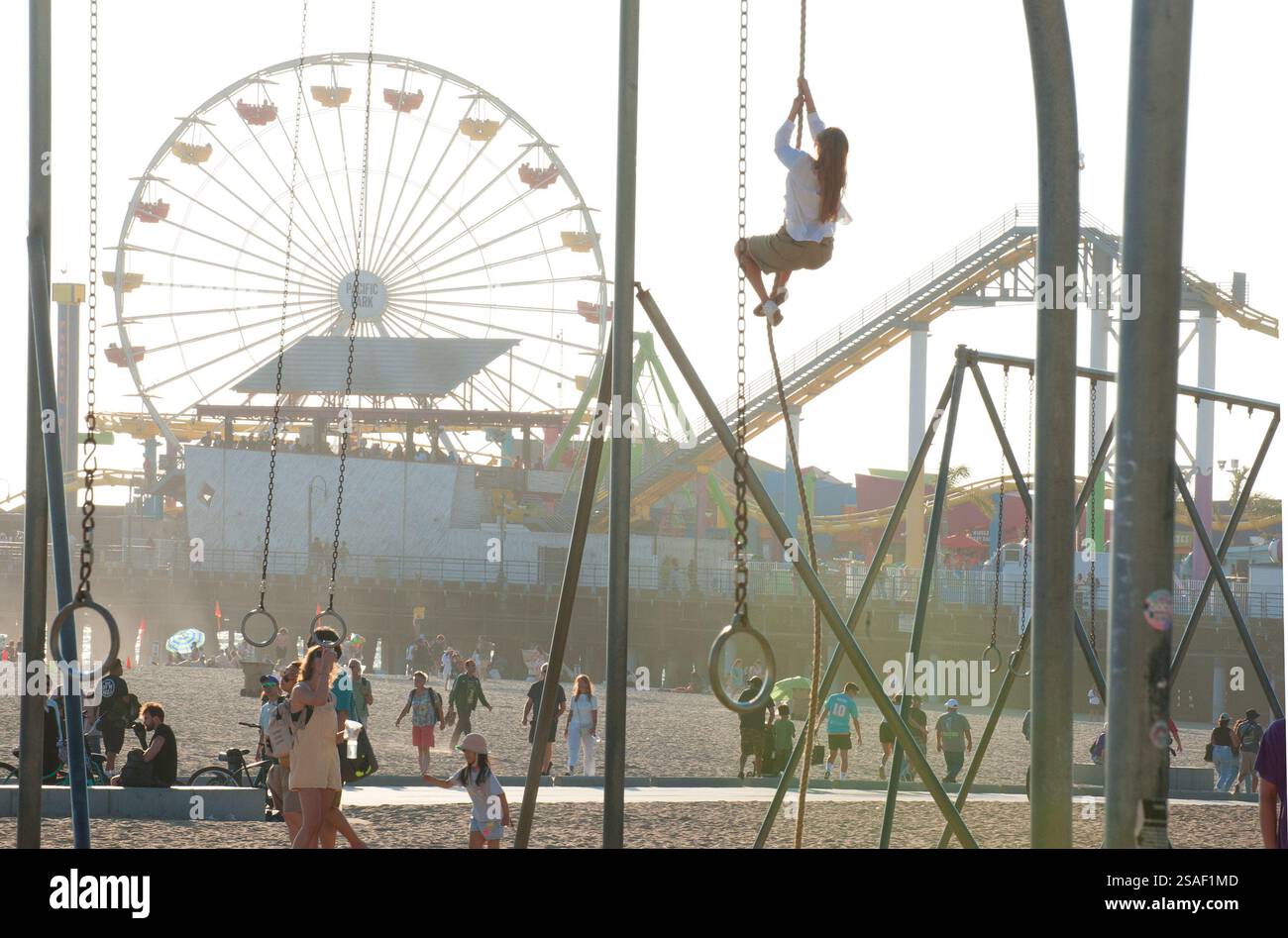 Muscle Beach, pier, people, Ferris wheel, ropes, rings, bike path ...