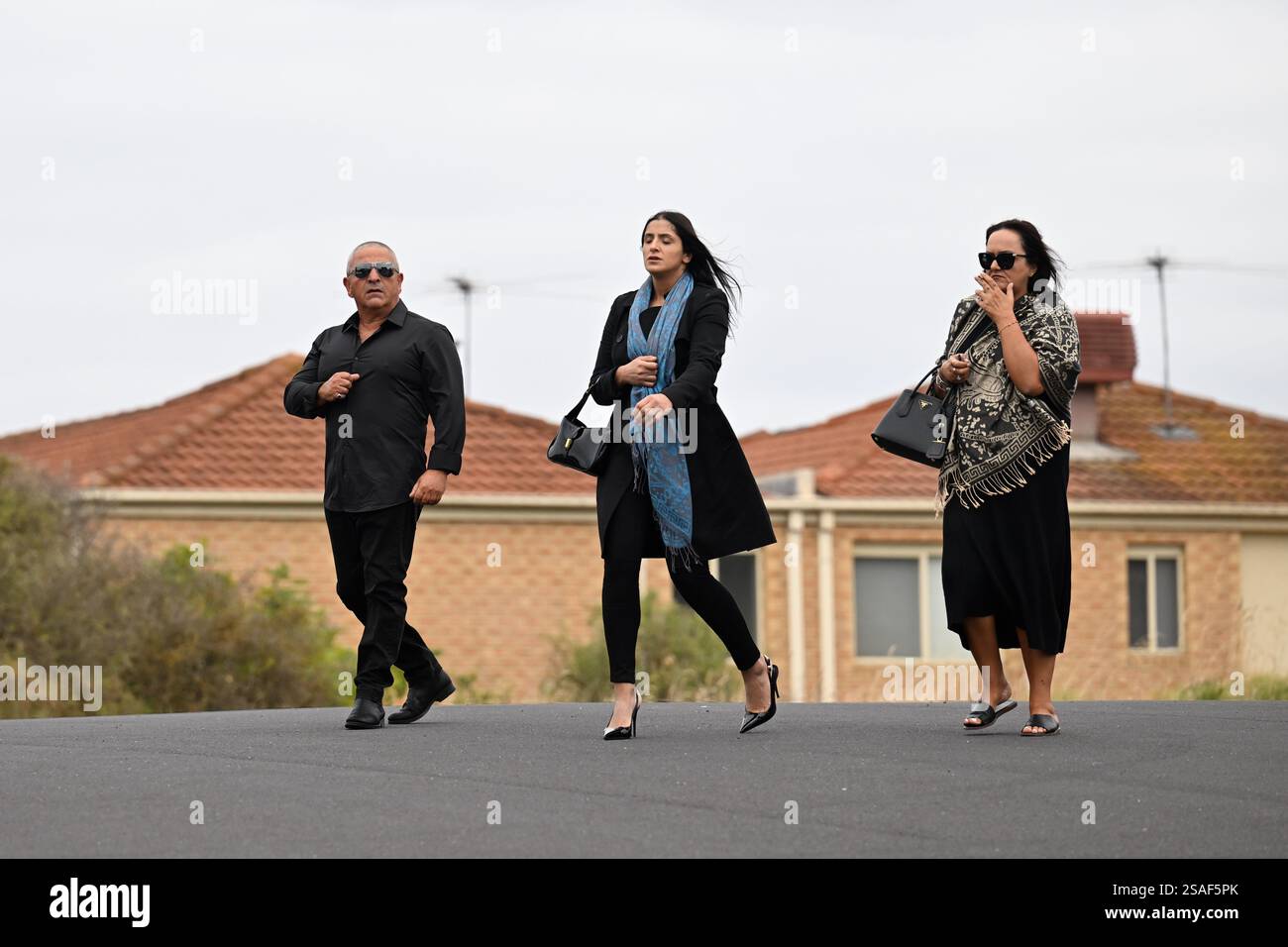 Australia. 30th Jan, 2025. Mourners arrive to the funeral service for ...