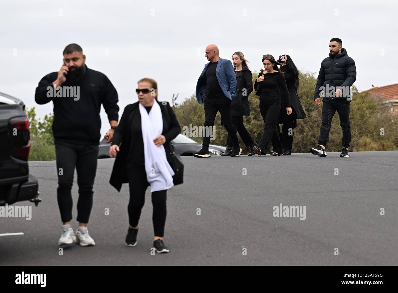 Australia. 30th Jan, 2025. Mourners arrive to the funeral service for ...