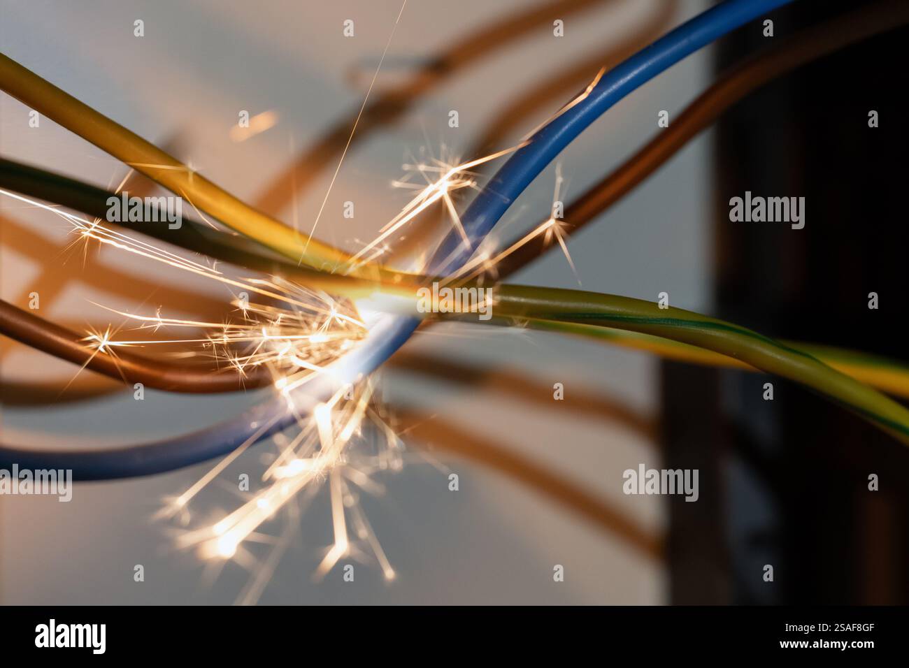 Sparking Electric Wires in a Short Circuit Stock Photo - Alamy