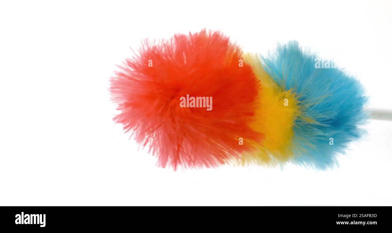 Colorful duster image with red, yellow, and blue feathers on white ...