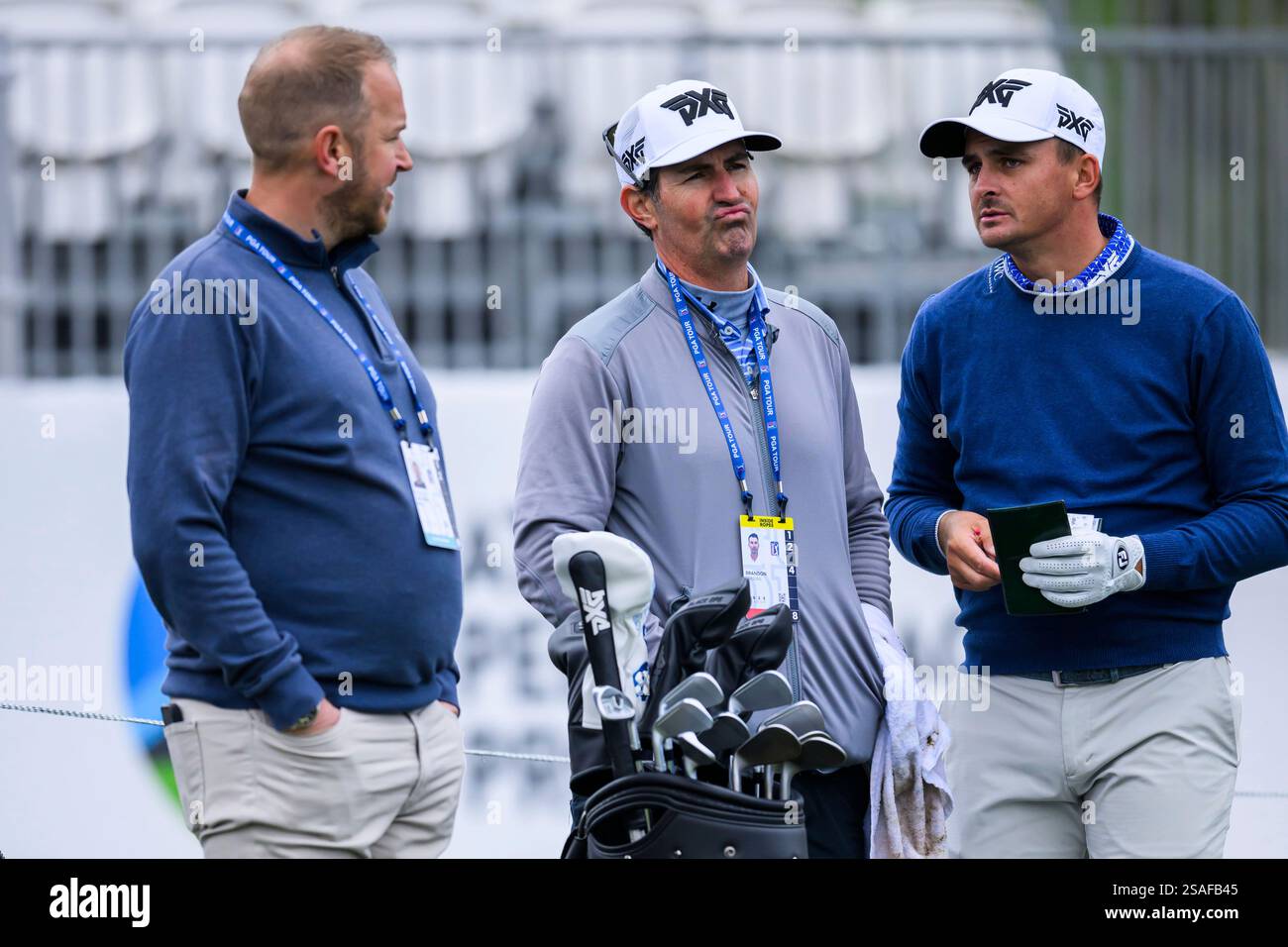 PEBBLE BEACH, CA - JANUARY 29: Christiaan Bezuidenhout talks with his ...