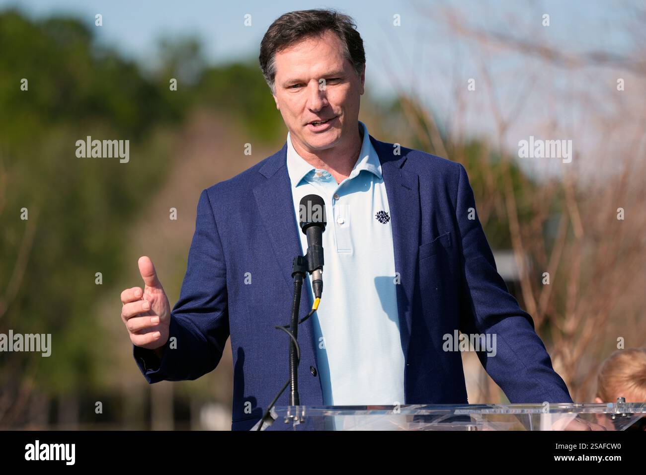 Steve Hogan, CEO of Florida Citrus Sports, speaks at a news conference ...