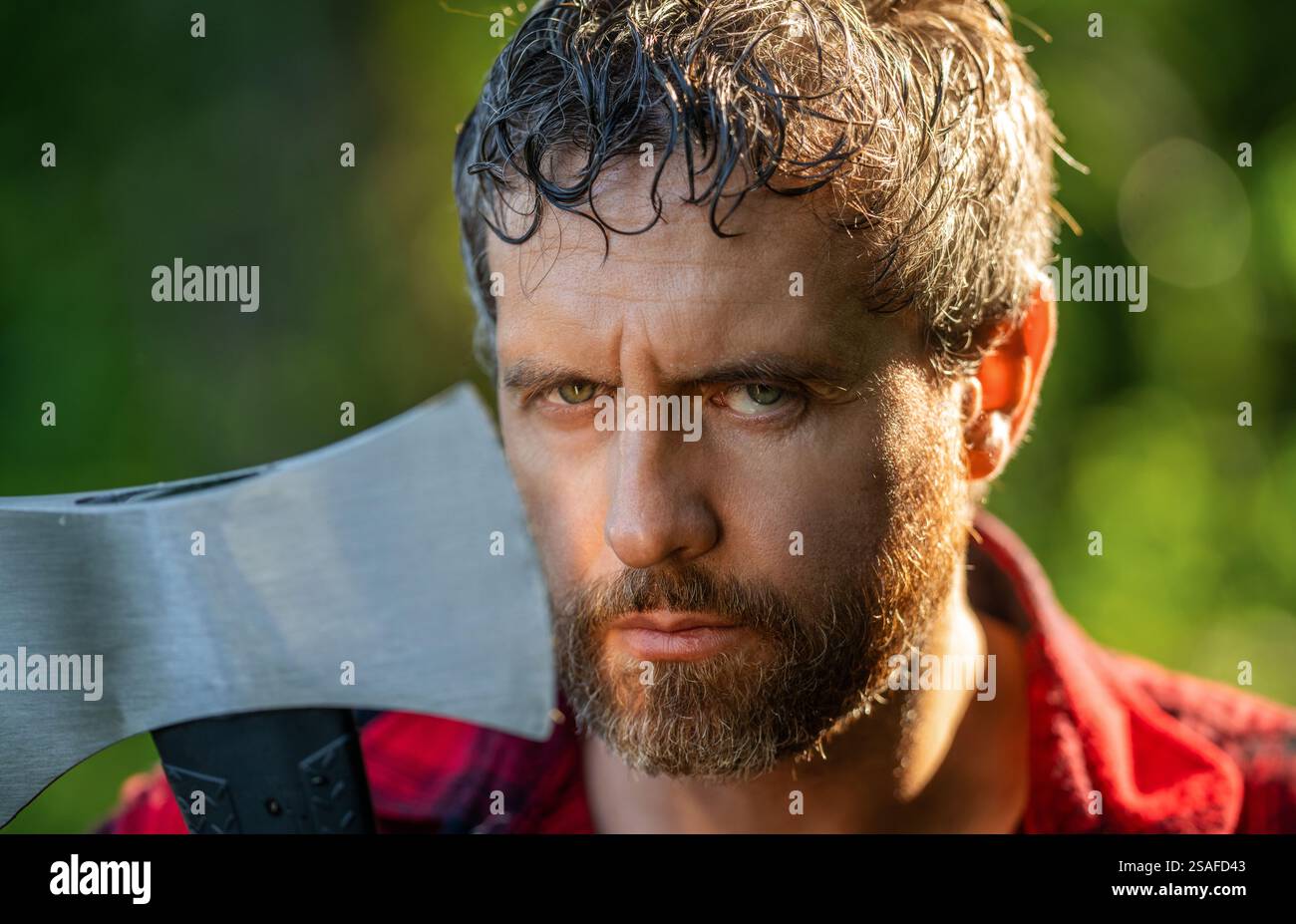 Man sweating with logging axe. Hardworking brutal man face. Logging ...
