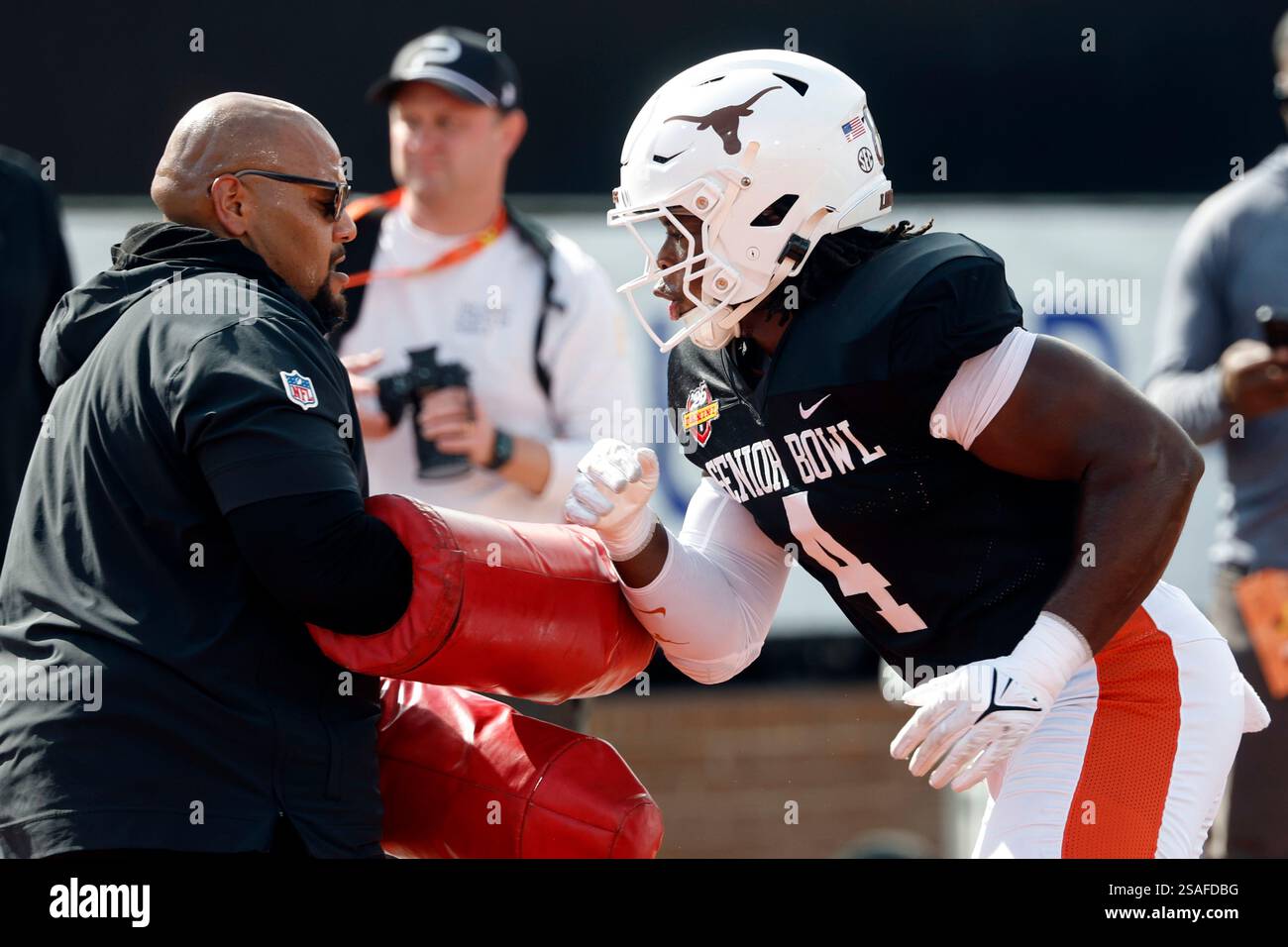 American team defensive lineman Barryn Sorrell of Texas (4) runs ...