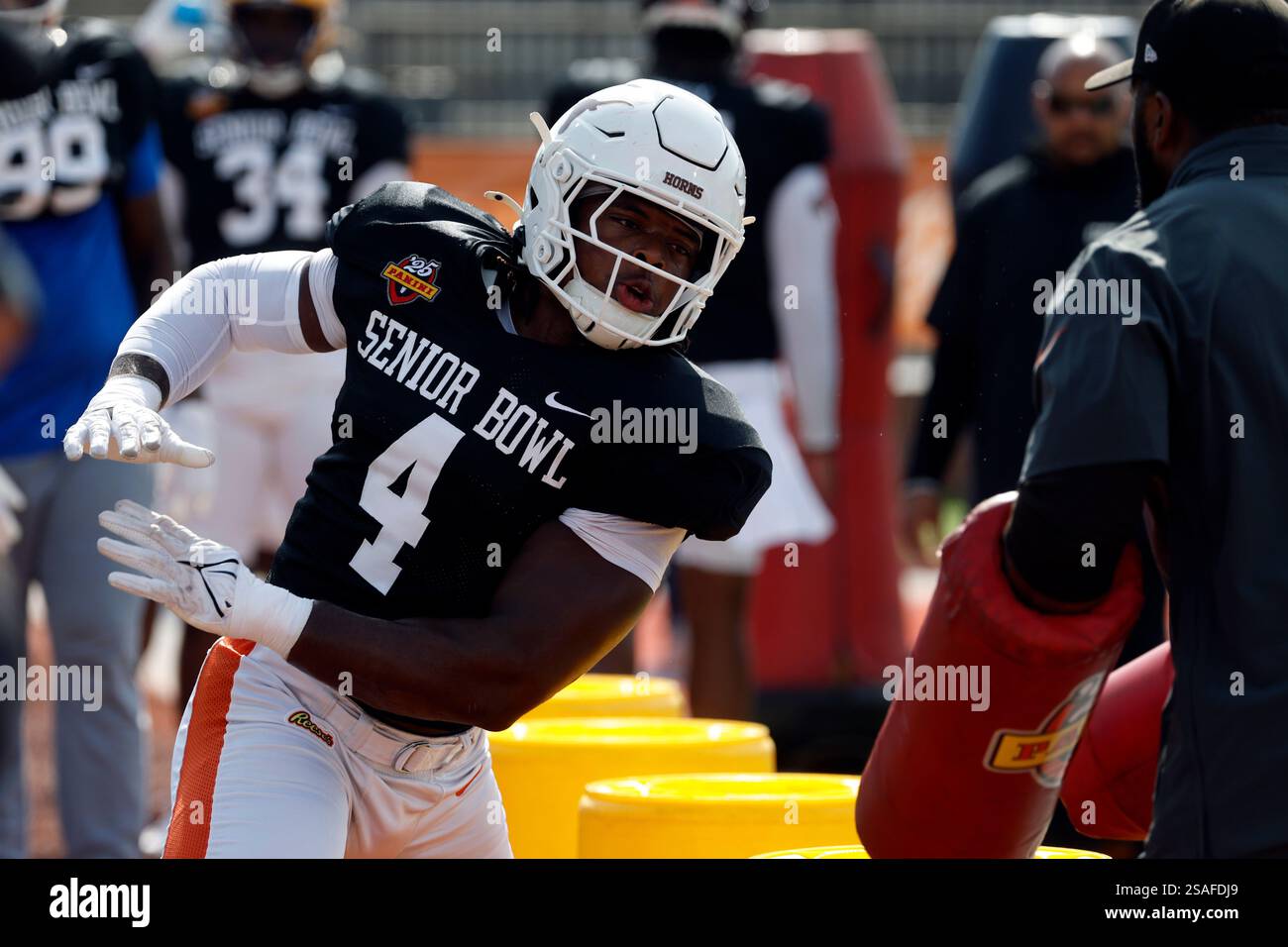 American team defensive lineman Barryn Sorrell of Texas (4) runs ...