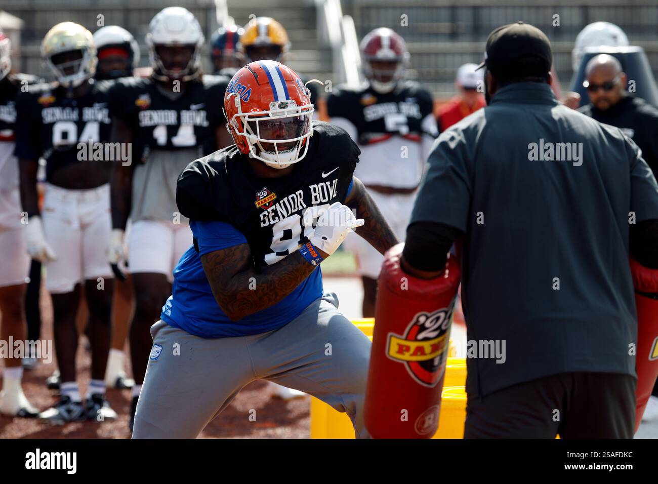 American team defensive lineman Cam Jackson of Florida runs through ...