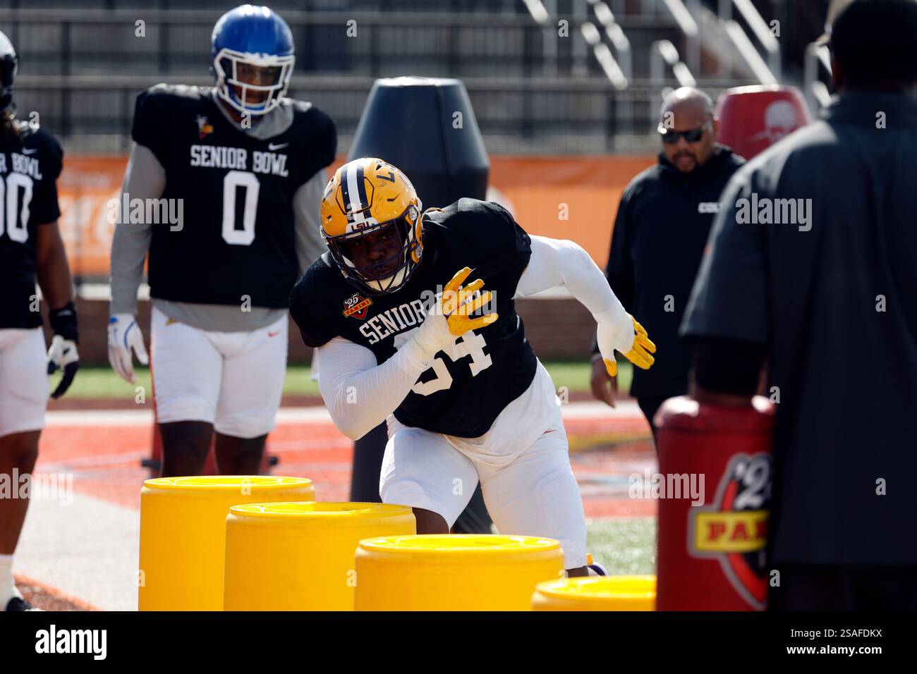American team defensive lineman Sai'vion Jones of LSU (34) runs through ...