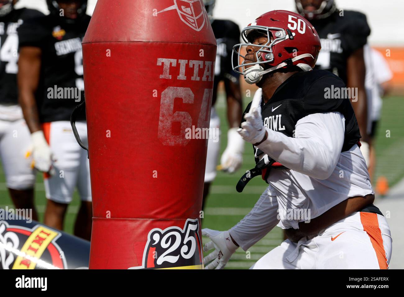 American team linebacker Tim Smith of Alabama (5) runs through drills ...
