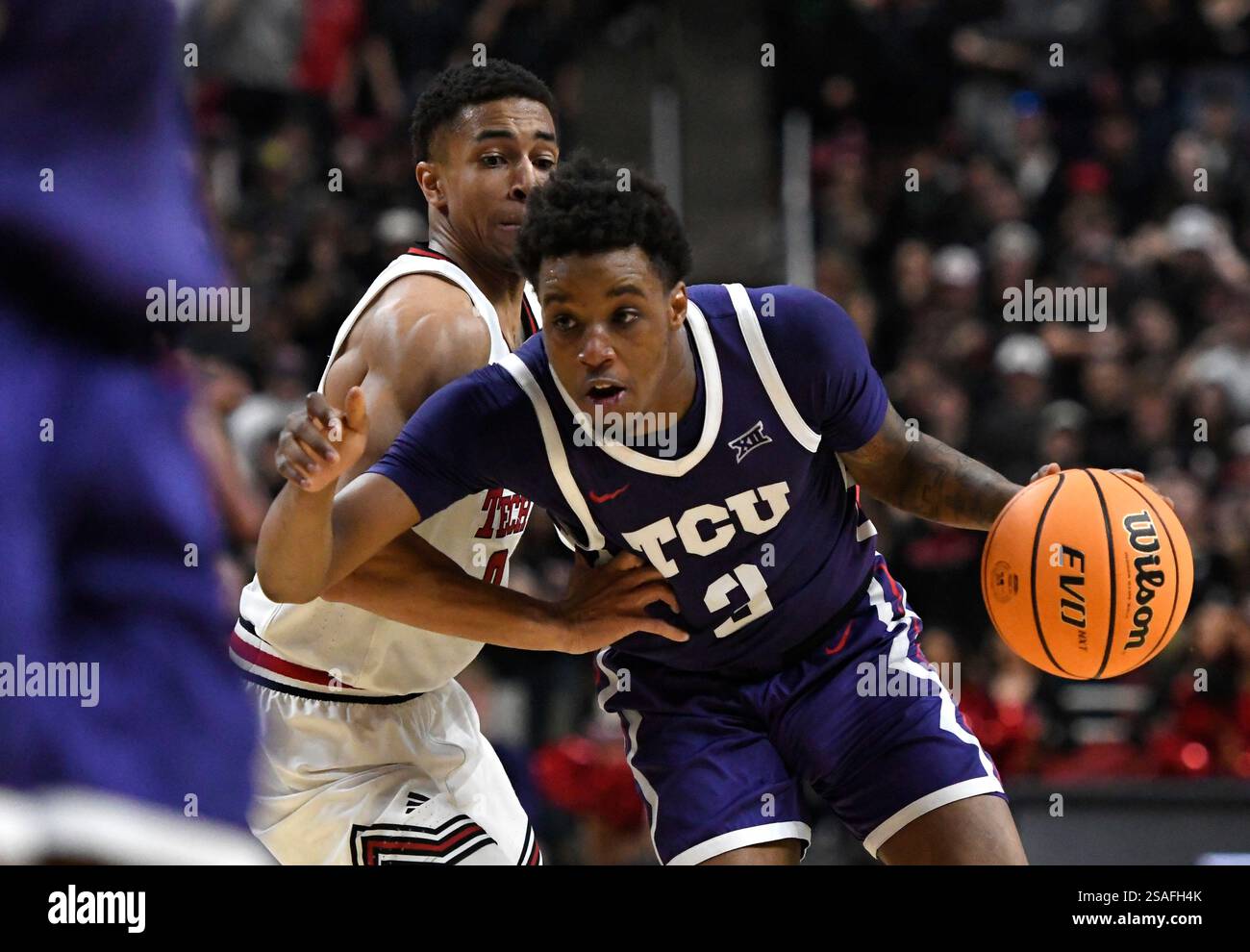TCU's guard Vasean Allette (3) dribbles the ball while Texas Tech's ...