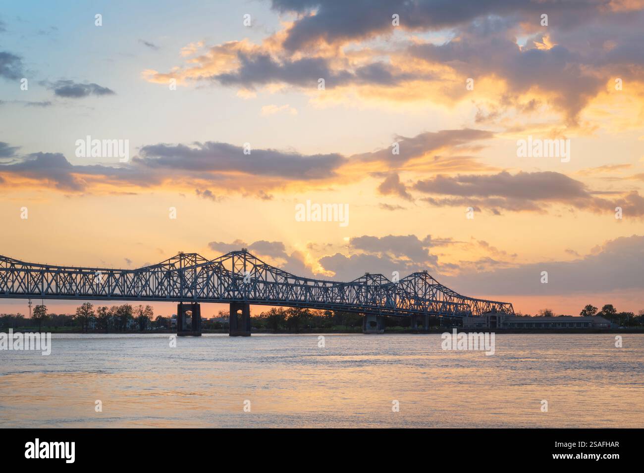 Natchez-Vidalia Bridge over the Mississippi River at sunset. Seen from ...