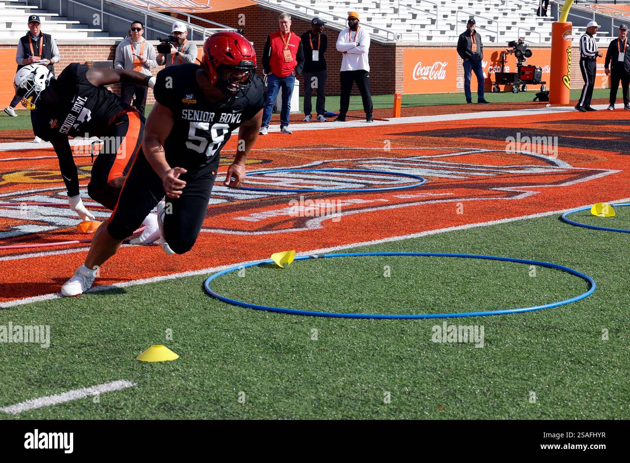 National team defensive lineman Junior Tafuna of Utah (58) runs through ...