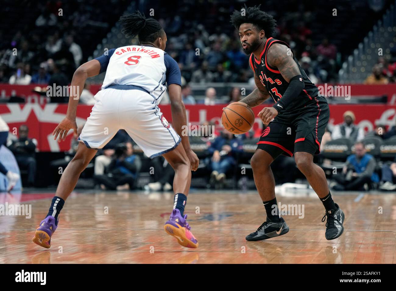 Toronto Raptors guard Jamal Shead (23) dribbles the ball as Washington ...