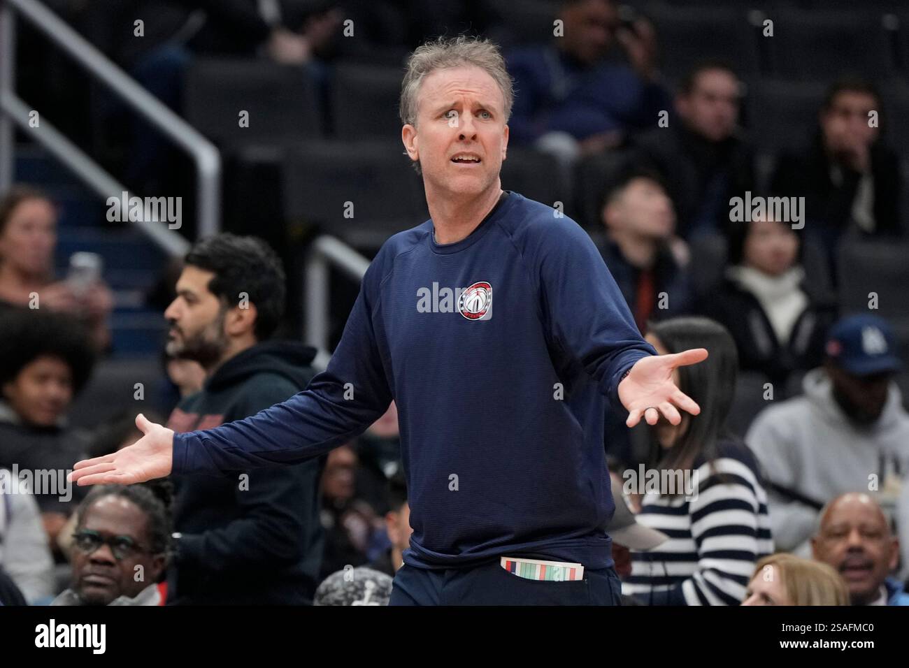 Washington Wizards head coach Brian Keefe reacts during the first half ...