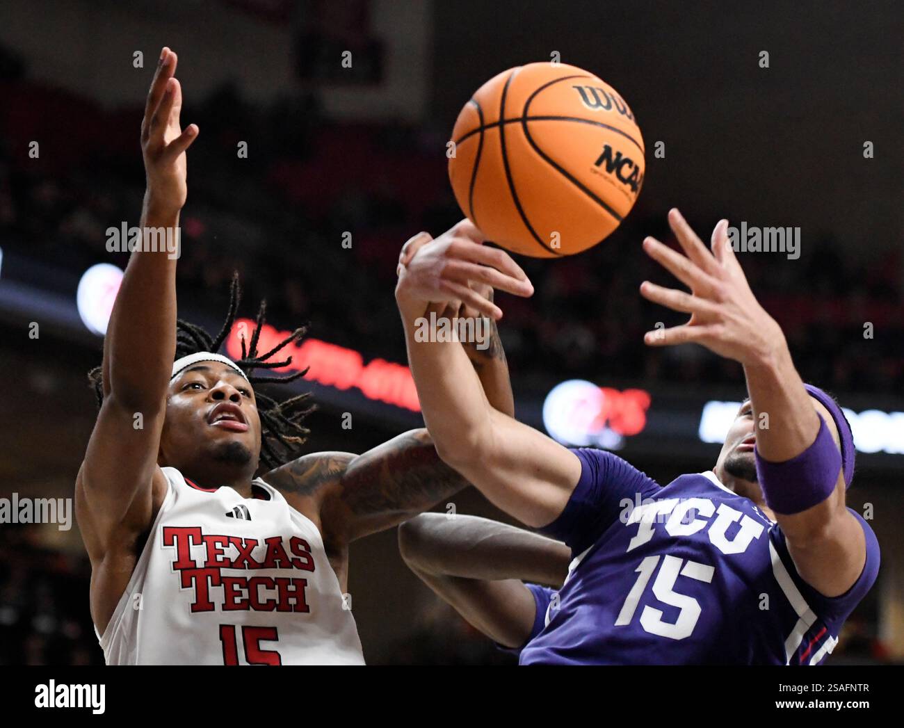 Texas Tech's forward JT Toppin (15) and TCU's forward David Punch (15 ...