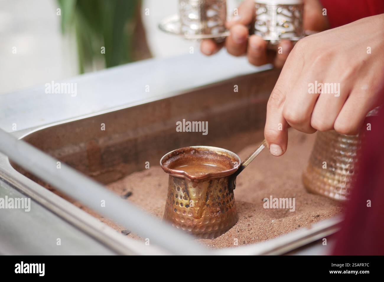 Making coffee the traditional way Stock Photo - Alamy