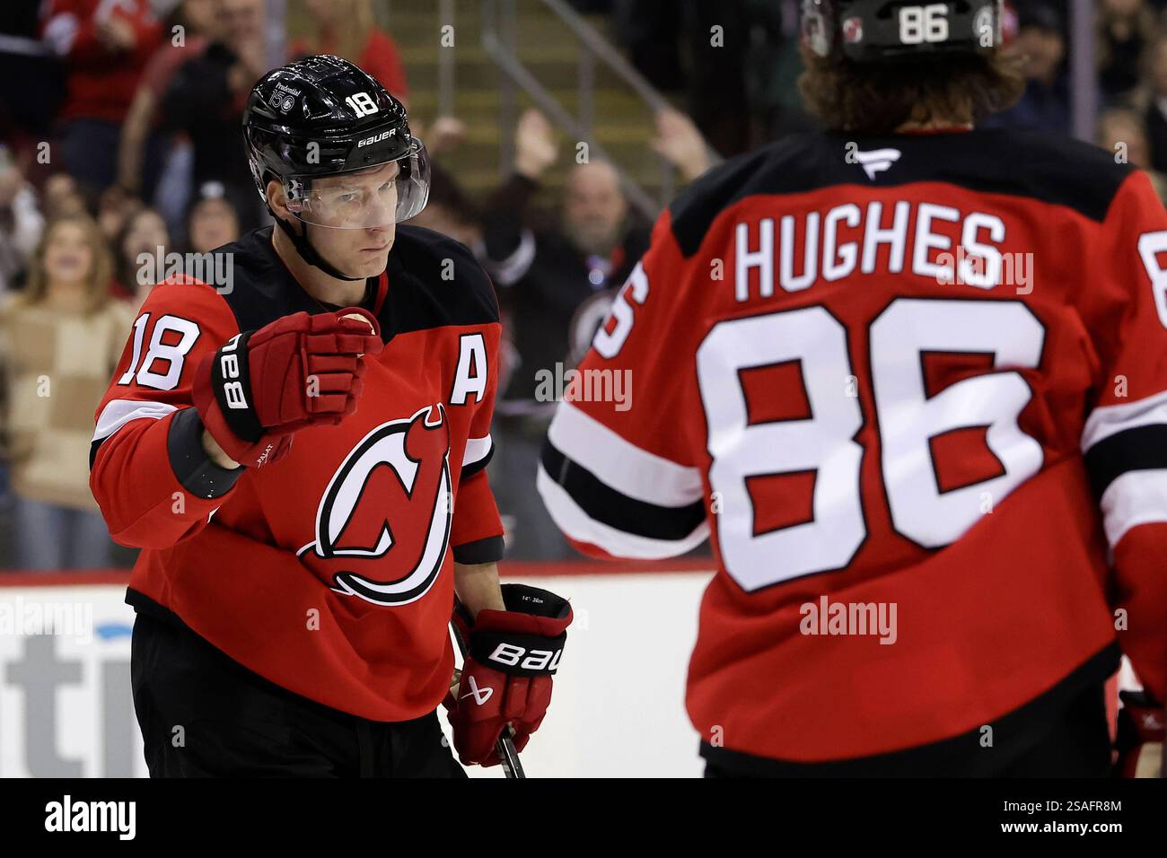 New Jersey Devils left wing Ondrej Palat (18) celebrates with Jack ...