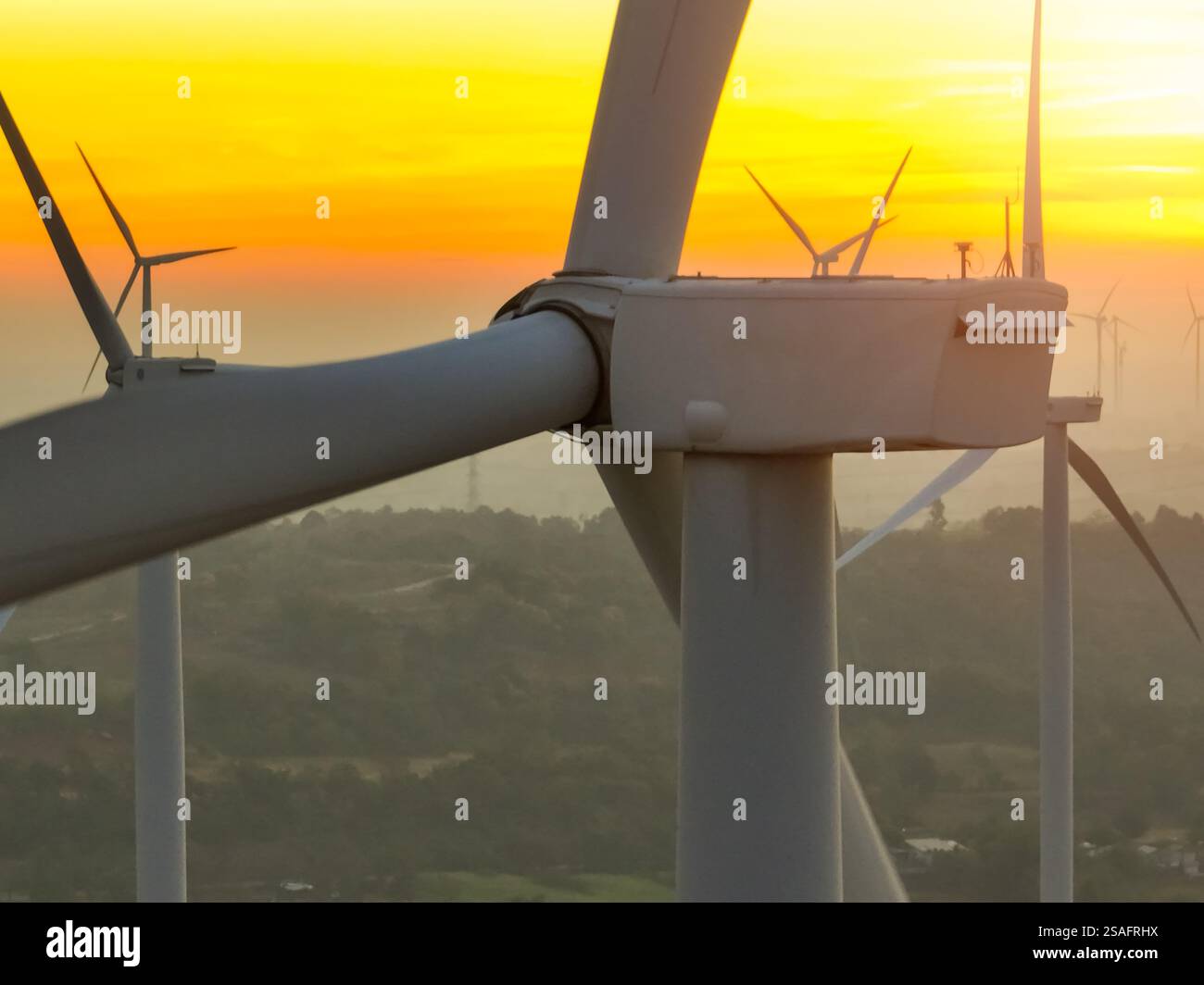 Wind farm field and sunset sky. Wind power. Sustainable, renewable ...