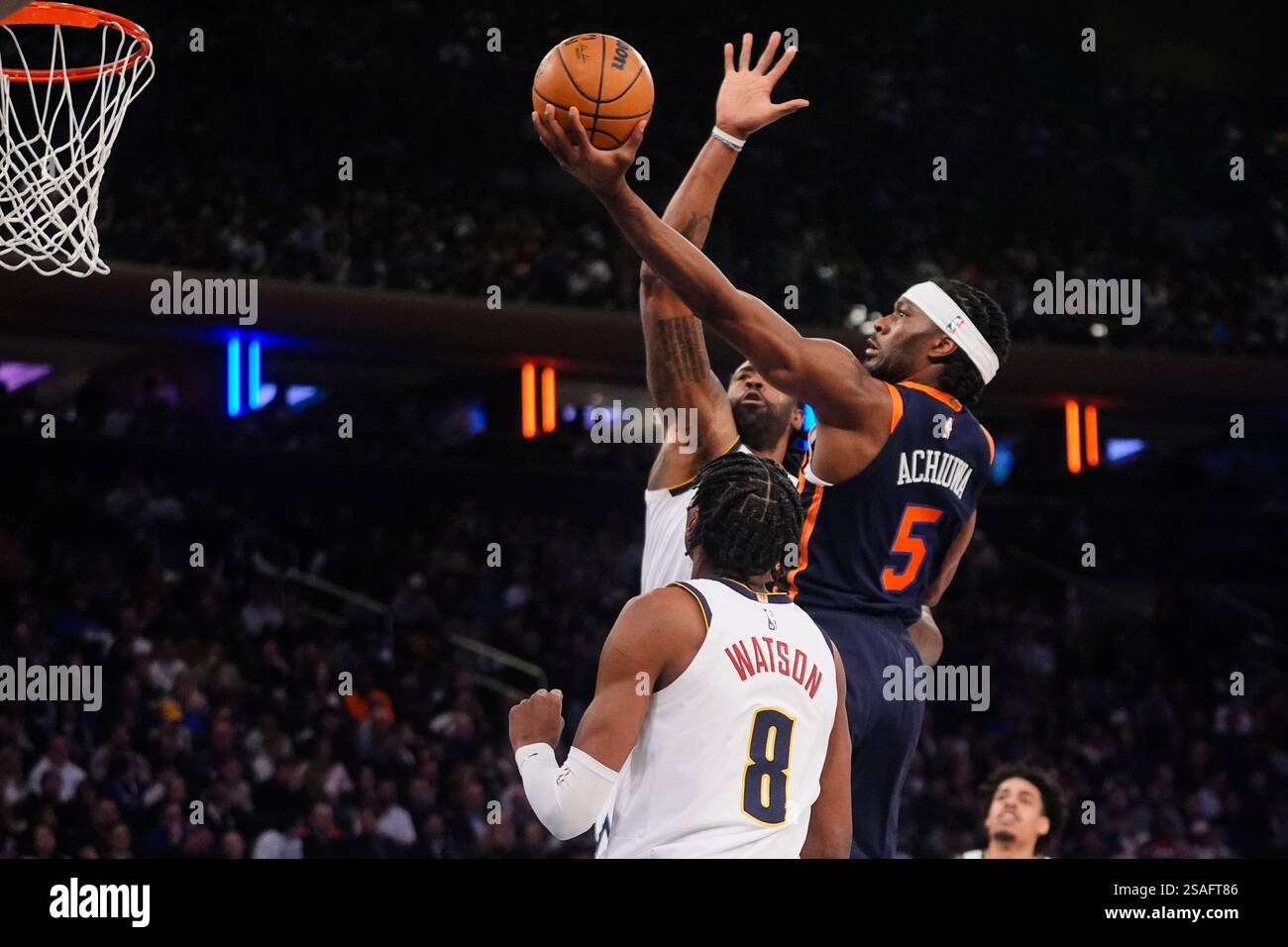 New York Knicks' Precious Achiuwa (5) drives past Denver Nuggets ...