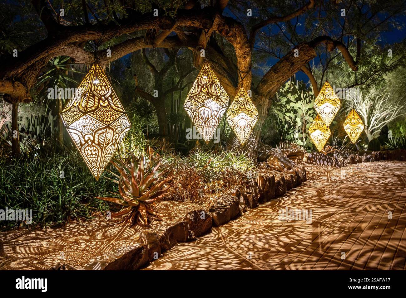 A nighttime view of intricate geometric light sculptures by HYBYCOZO ...