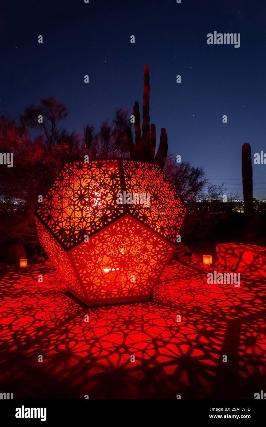 A nighttime view of intricate geometric light sculptures by HYBYCOZO ...