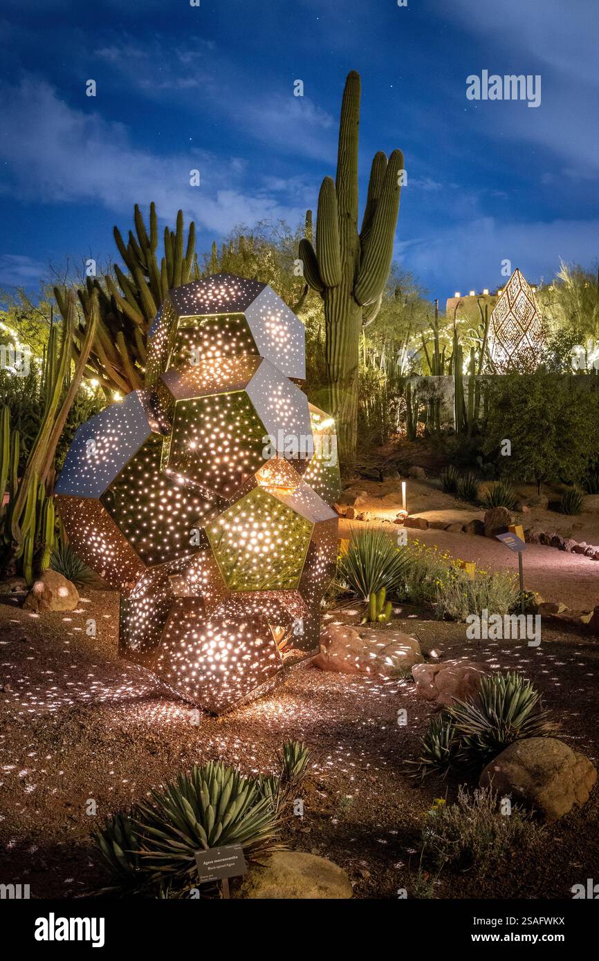 A nighttime view of intricate geometric light sculptures by HYBYCOZO ...