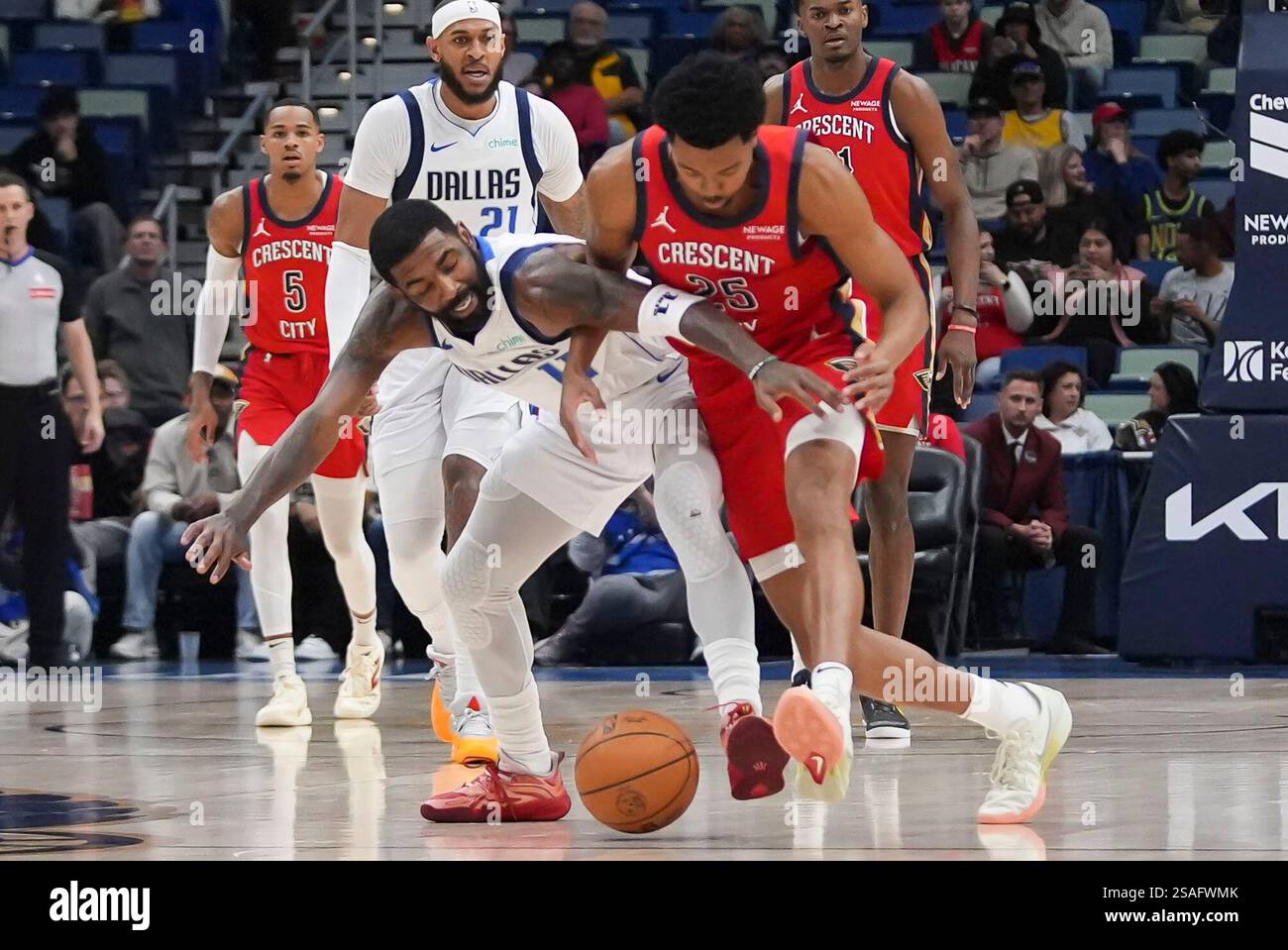 Dallas Mavericks guard Kyrie Irving (11) and New Orleans Pelicans guard ...