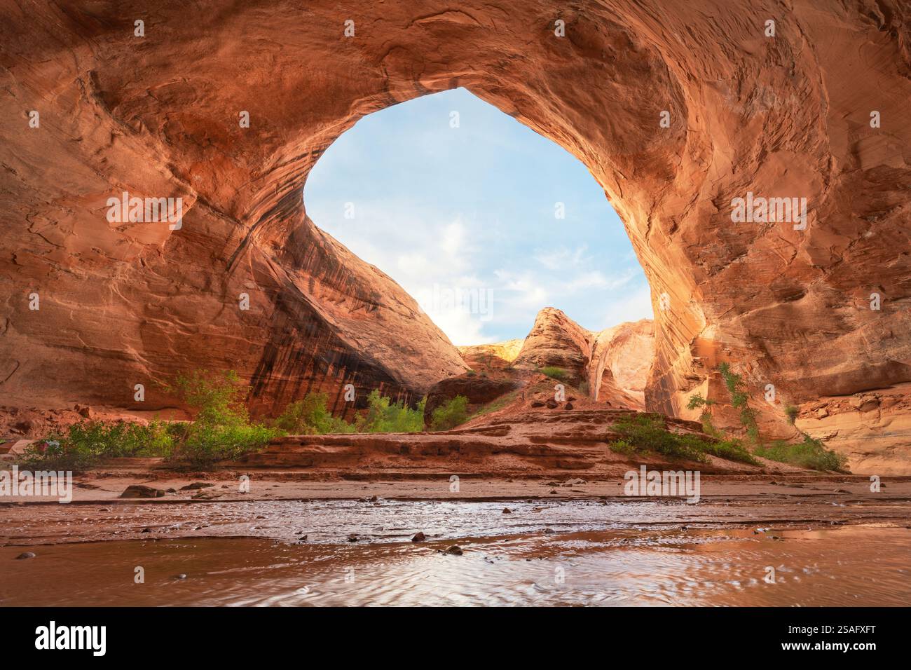 Steam flowing through giant alcove adjacent to Jacob Hamblin Arch in ...