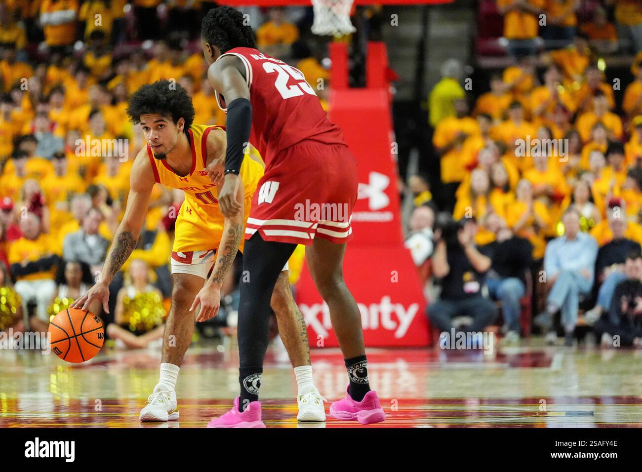 Maryland guard Ja'Kobi Gillespie looks to pass in front of Wisconsin ...