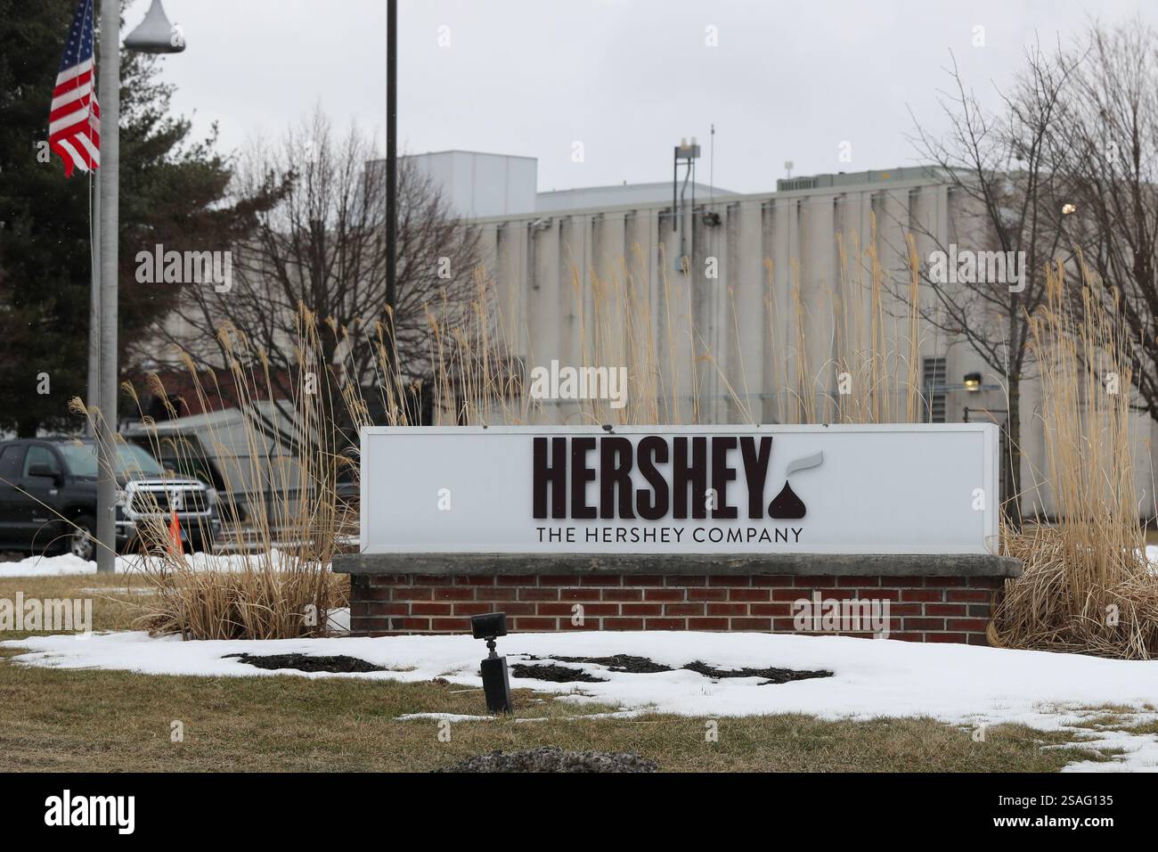 A sign with the Hershey logo is seen outside of the Hershey Company ...