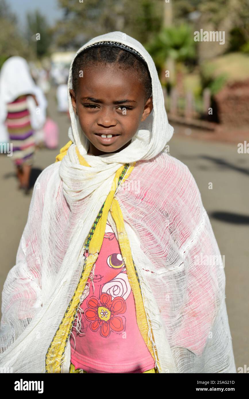 Portrait of an Ethiopian girl wearing a traditional netela for Sunday ...
