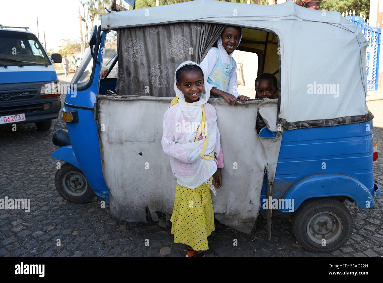 Cute children looking out an Indian Auto Rickshaw in Gondar, Ethiopia ...
