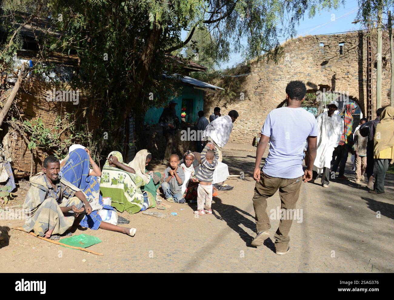 Beggars sitting outside a church in Gondar, Ethiopia Stock Photo - Alamy