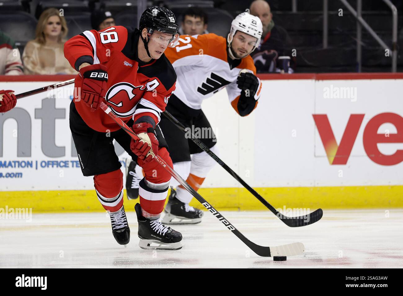 New Jersey Devils left wing Ondrej Palat (18) skates with the puck past ...