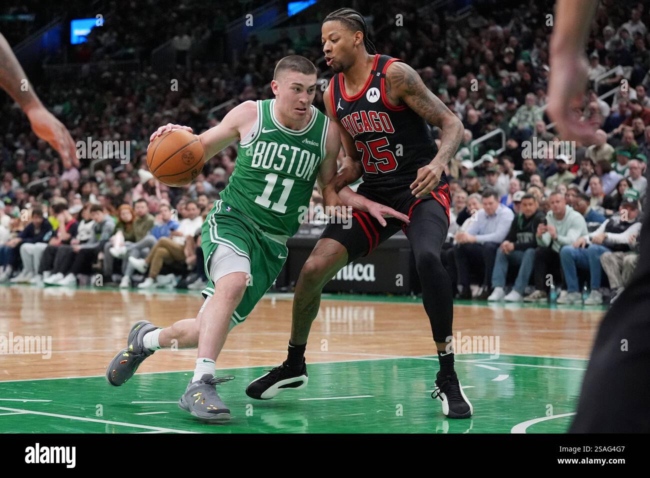 Boston Celtics guard Payton Pritchard (11) drives to the basket against ...