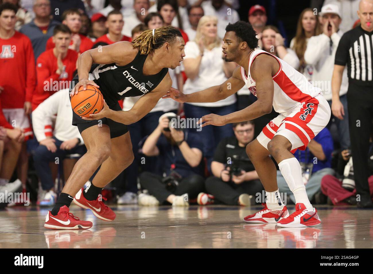 TUCSON, AZ - JANUARY 27: Arizona Wildcats forward Tobe Awaka #30 guards ...