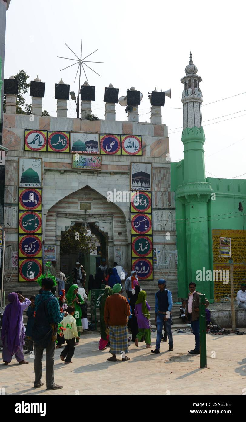 Sufi pilgrims at the external courtyard of the tomb of Sufi saint Zinda ...