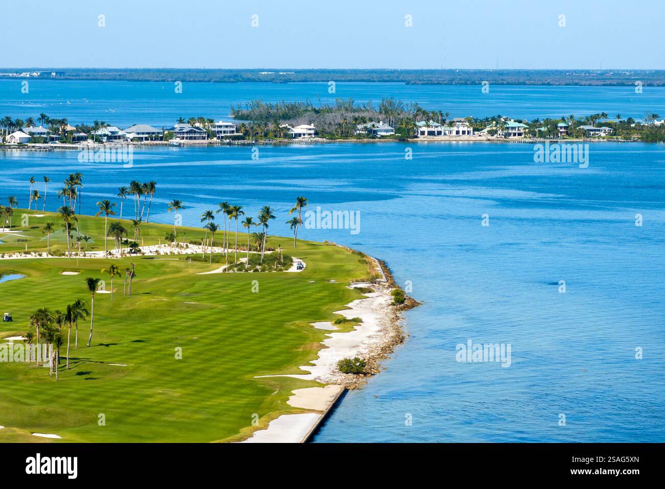 Aerial view of large golf field with green grass in Boca Grande, small ...